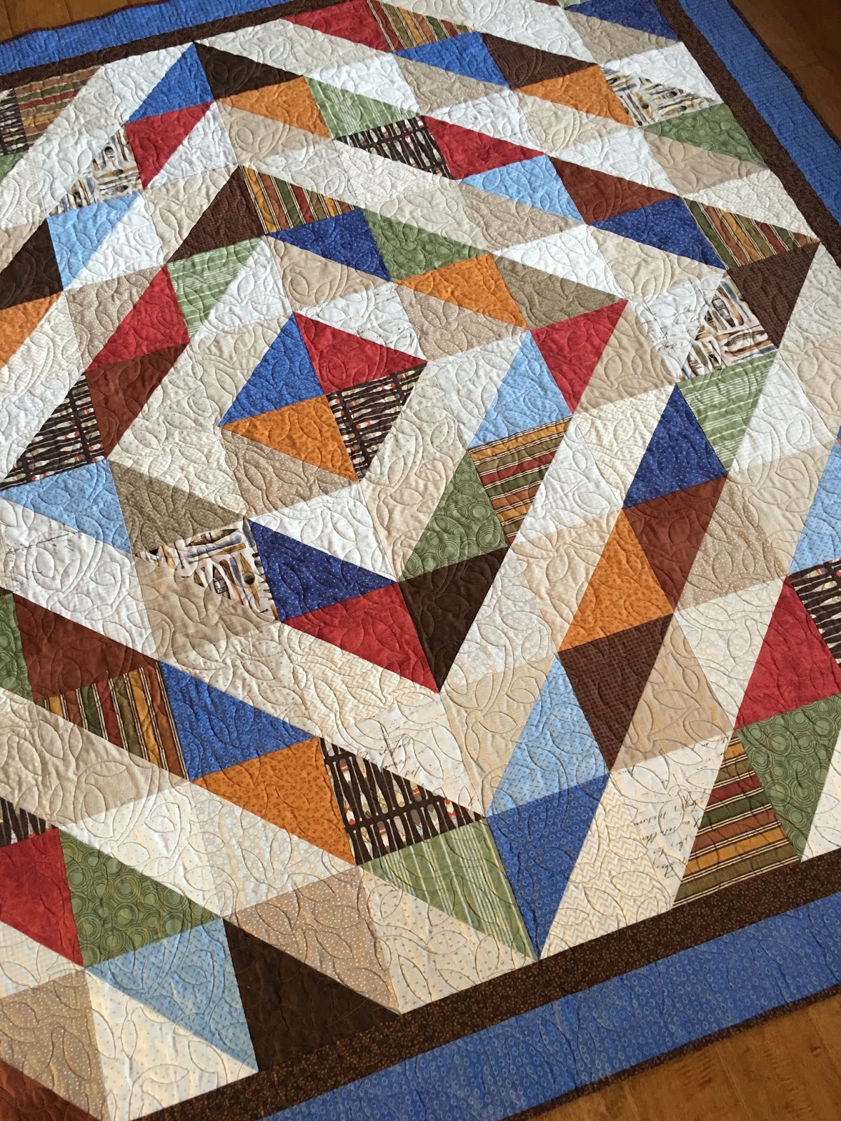 Carried Away Quilting: Luke’s Half Square Triangle Around the World Quilt