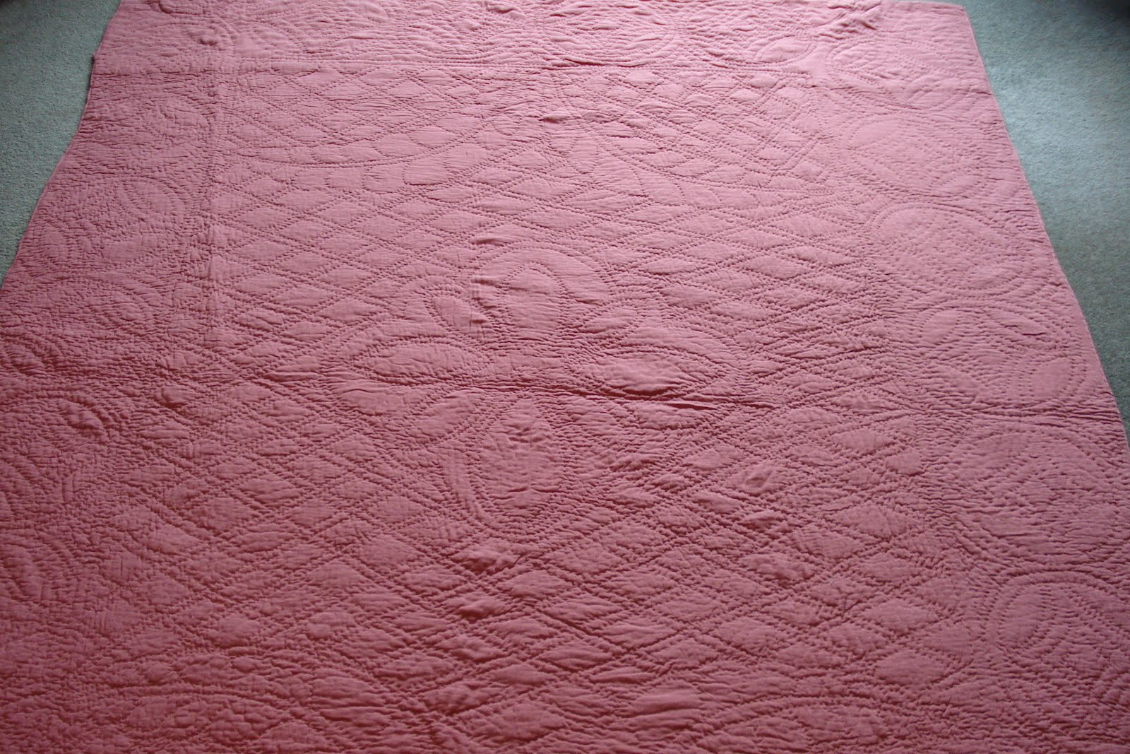 Welsh Quilts: Lively Paisley and Plain Pink Welsh Quilt