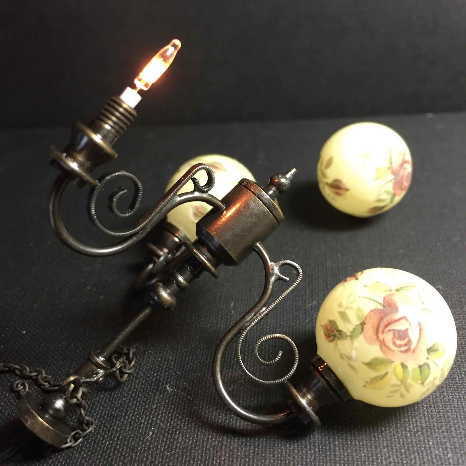 Ray Storey three arm pendant lights