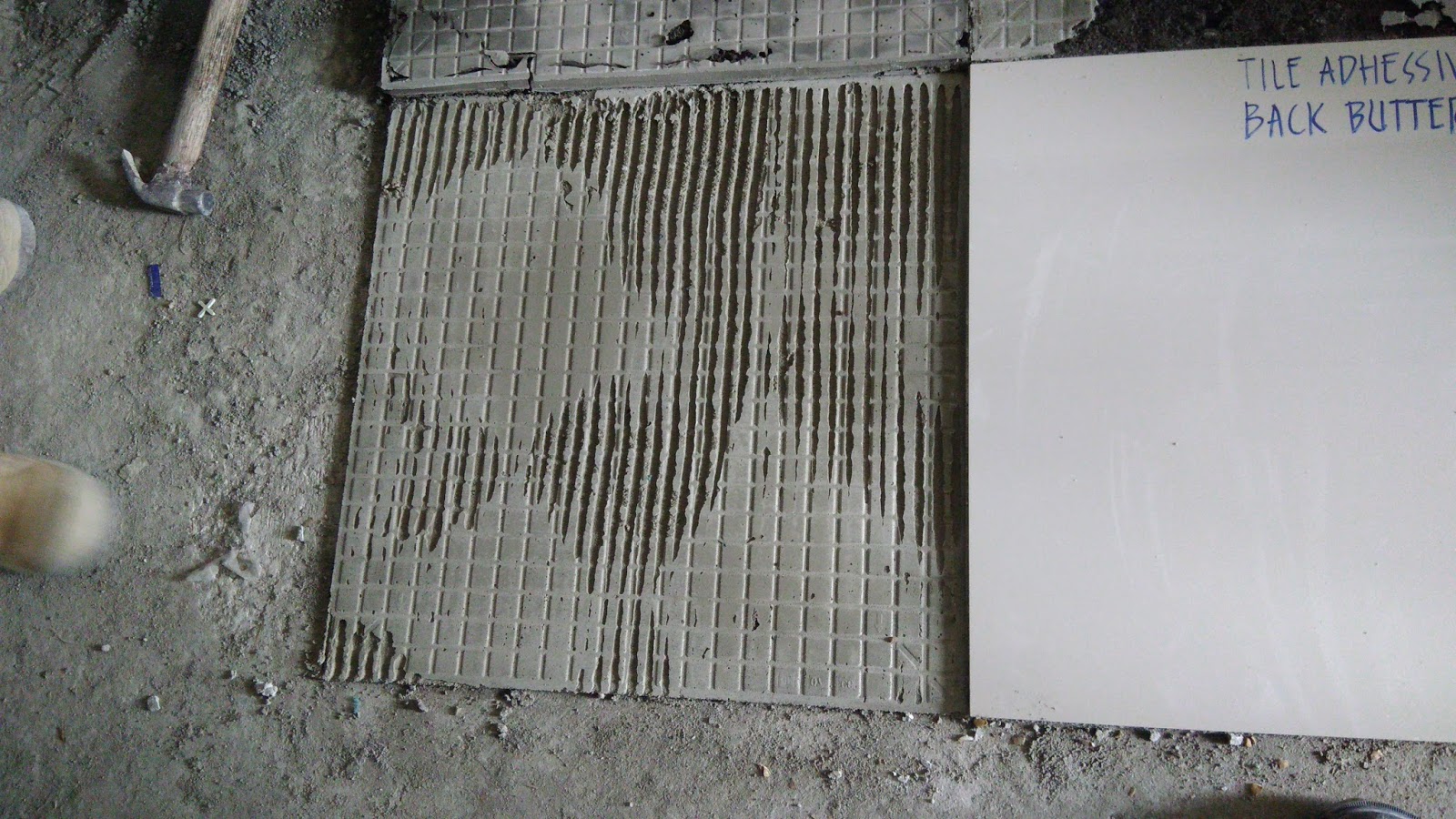 BUILDER'S JOURNAL: TILE INSTALLATION: NOTCHED TROWEL COMB TECHNIQUE