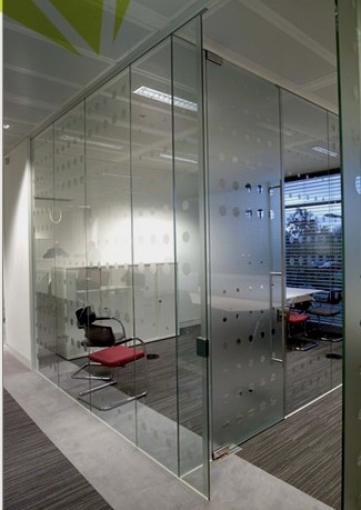 Full height frame-less glass partition