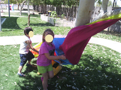 Play-Based Classroom: Exploring wind with a parachute