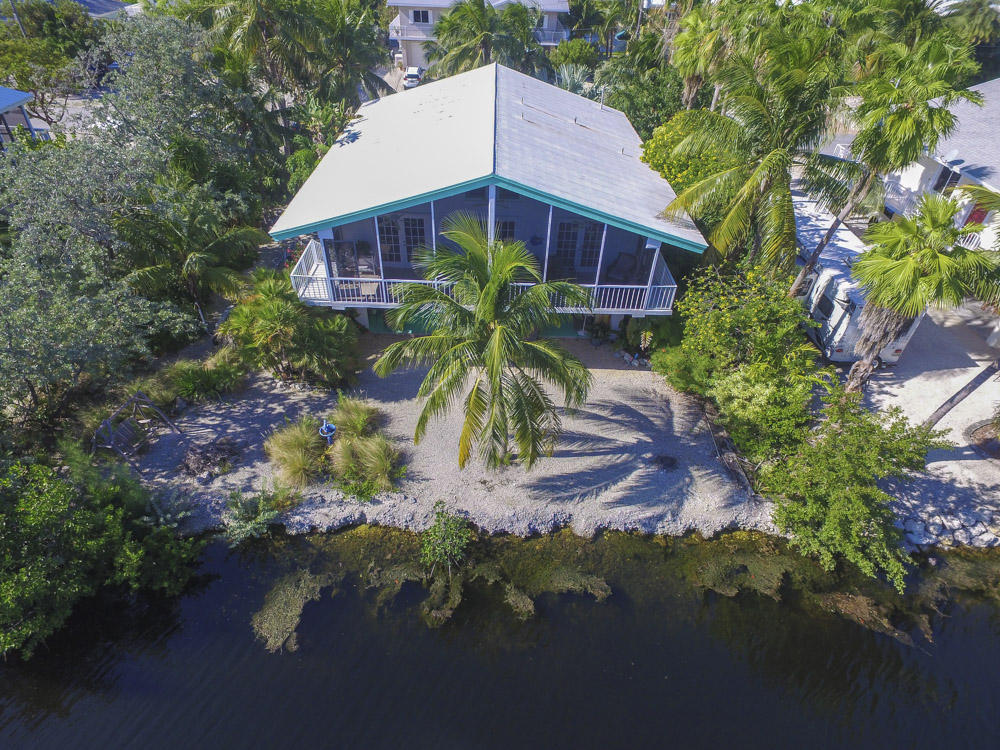 Real Estate in the Florida Keys: House on canal with assigned boat slip ...