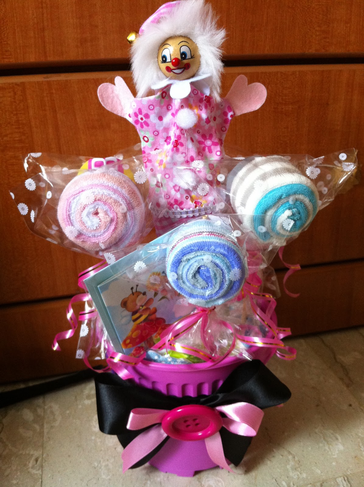 Nurie's Creations - Diaper Cakes & Baby Gifts: Towel Lollipop Diaper Pot