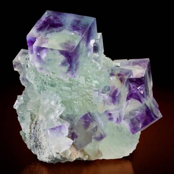 '18 : Cluster of Cubo-octahedral Fluorite Crystals of Deep Raspberry Purple