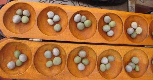 The Unknown Nigeria : AYO OLOPON: One of the Oldest Games in Yorubaland