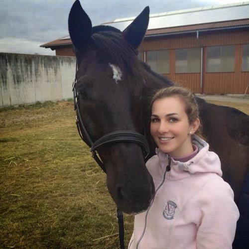 Lisa Muller Riding A Horse