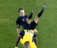 Spanish soccer referee falls over Atletico Madrid's Joshua Guilavogui ...