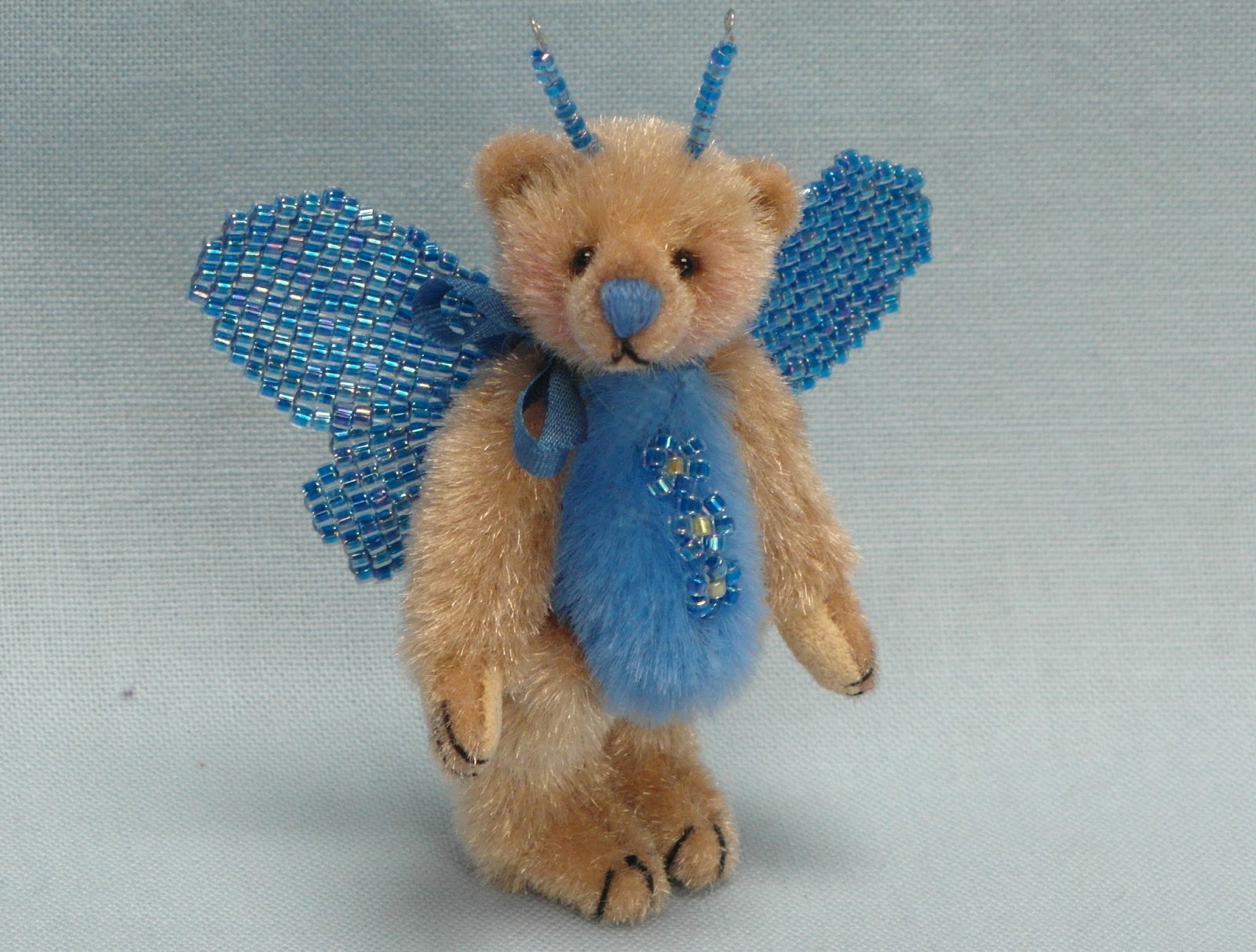 LOUISE PEERS: Capri , a blue butterfly bear