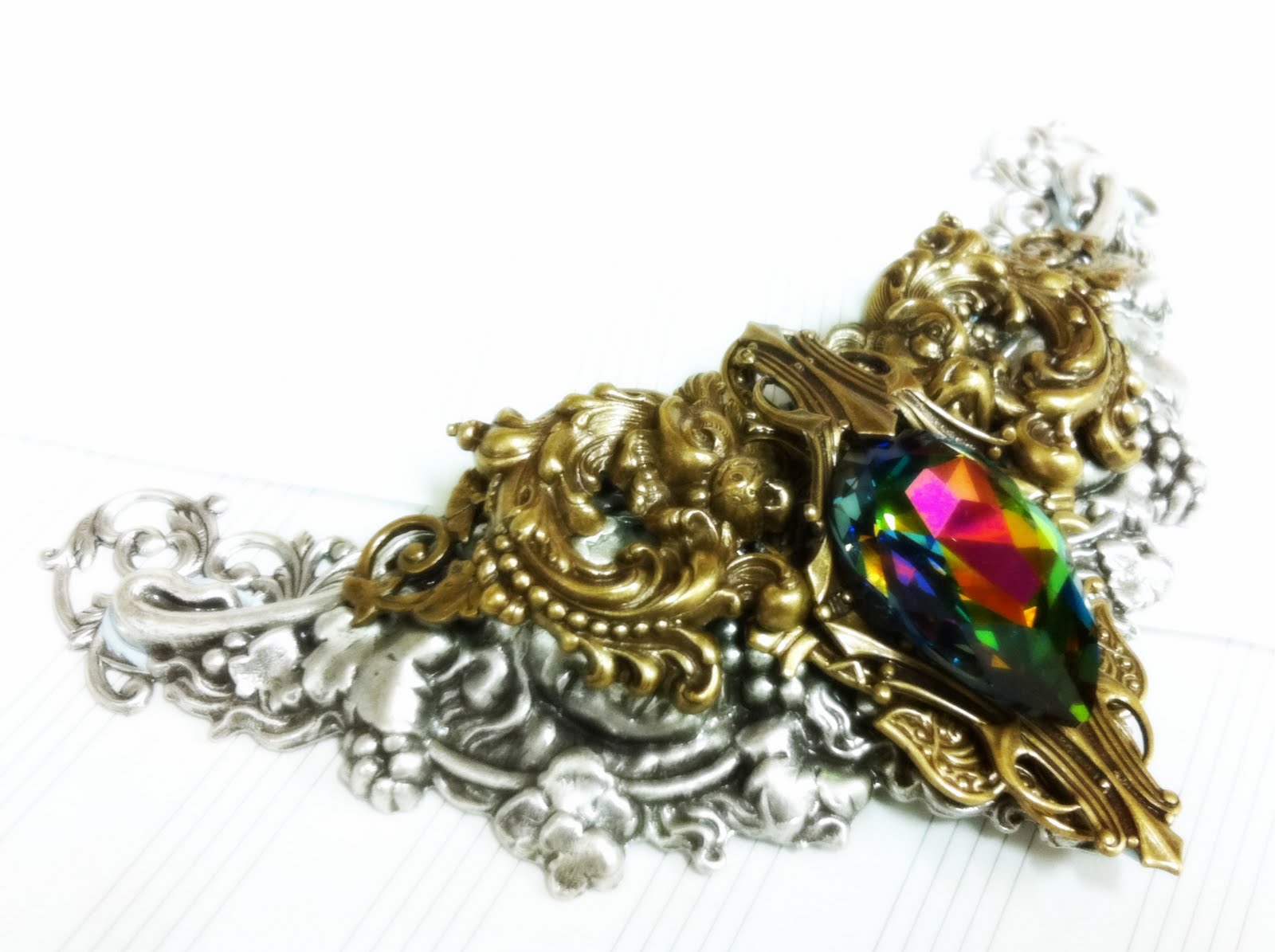 Handmade wire wrapped, filigree, fantasy and steampunk jewelry.