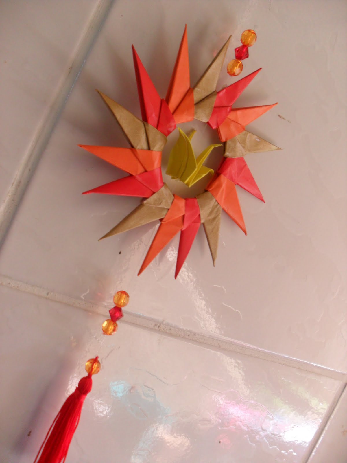 Dobras de Arte - Origami: Mandala do sol