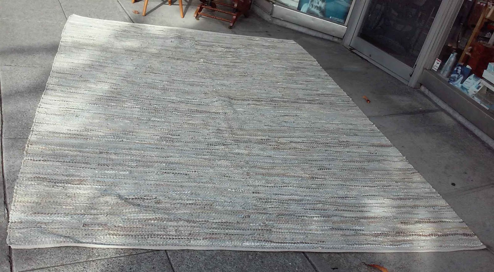 UHURU FURNITURE & COLLECTIBLES: SOLD 10.5' x 7.5' Leather Rag Rug - $40