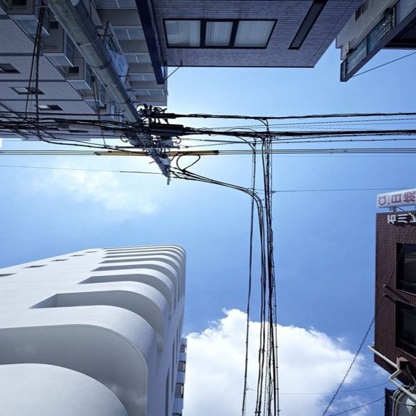 Japan's Minimal Apartment Tower Resembles a White Ship ~ Big Fun - The ...