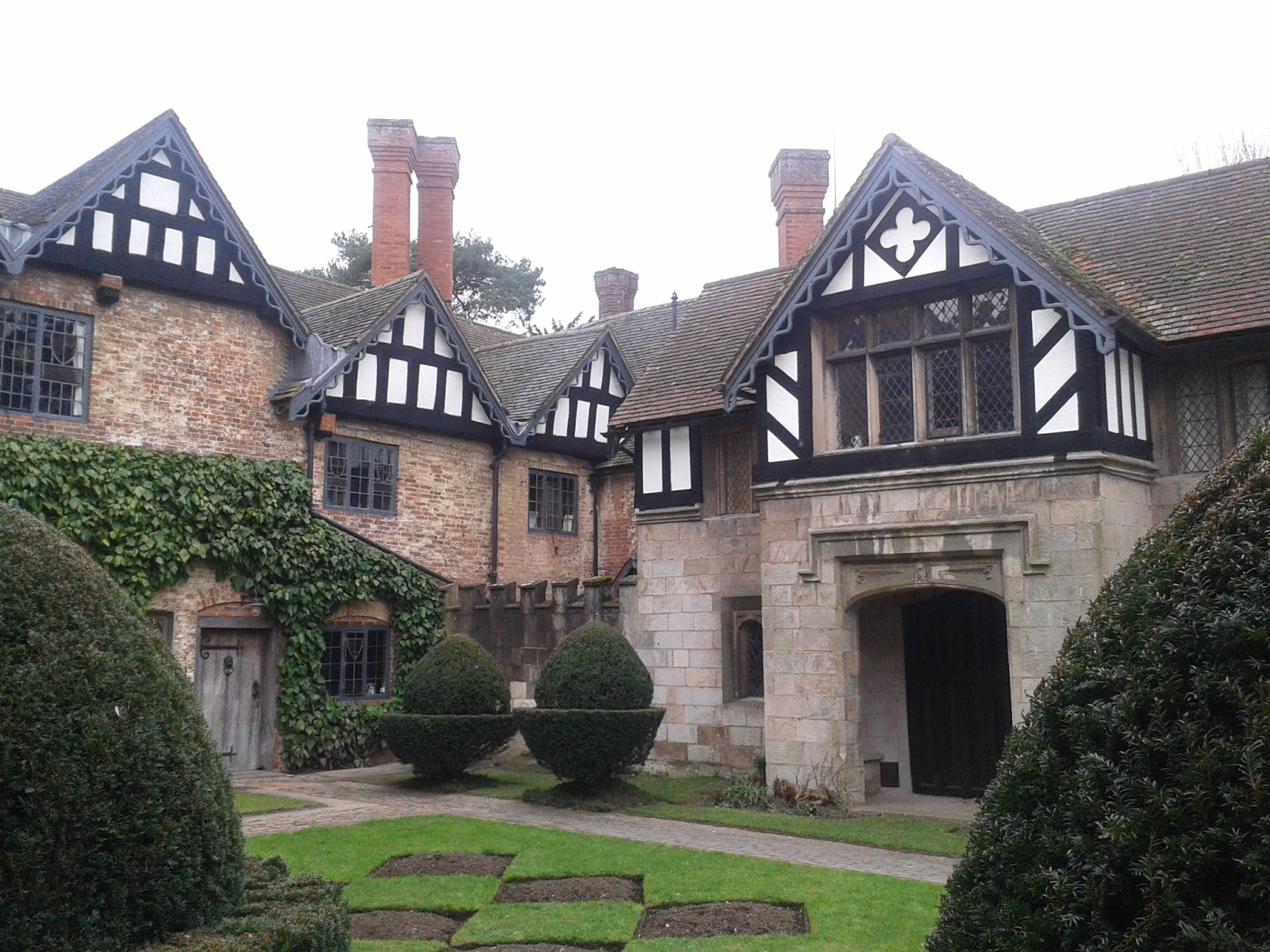 Baddesley Clinton, a moated manor house in Warwickshire with decorative ...
