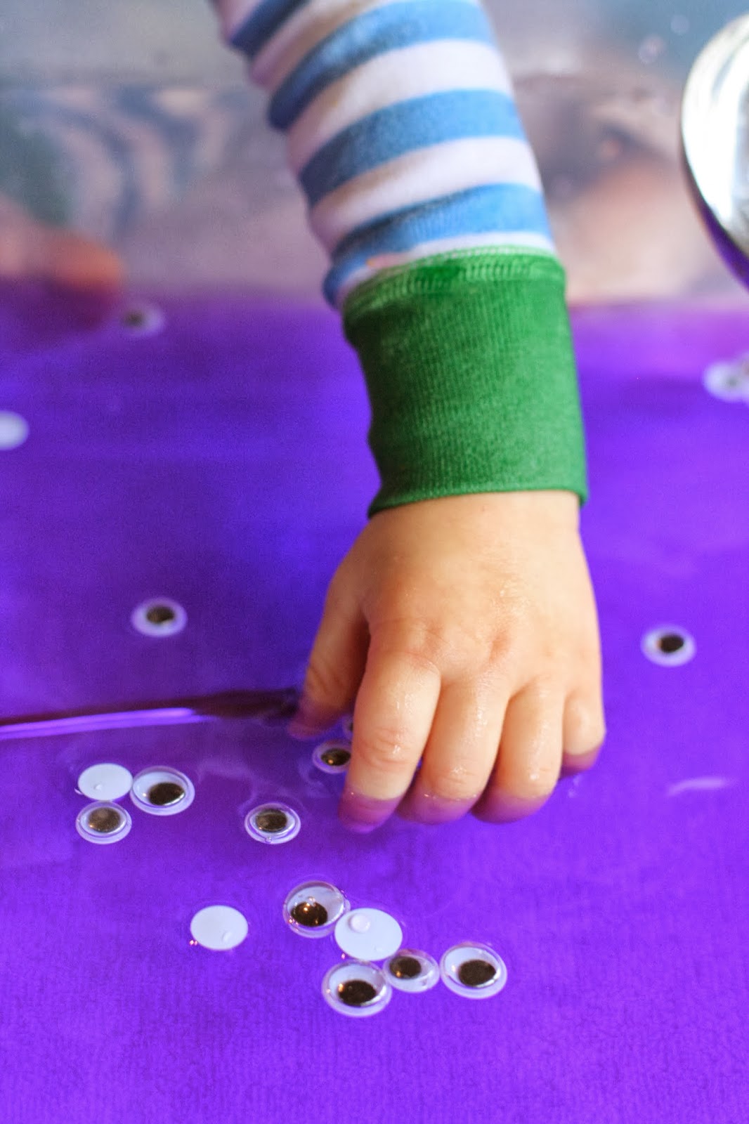 Colored Water Sensory Bin: Googly Eye Soup