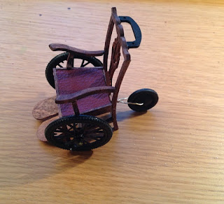 Dollhouse escapes: Miniature wheelchair