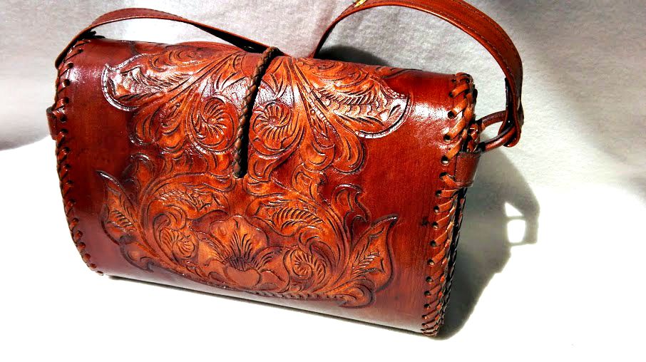 brandylovesvintage: vedasto: convertible tooled leather bag