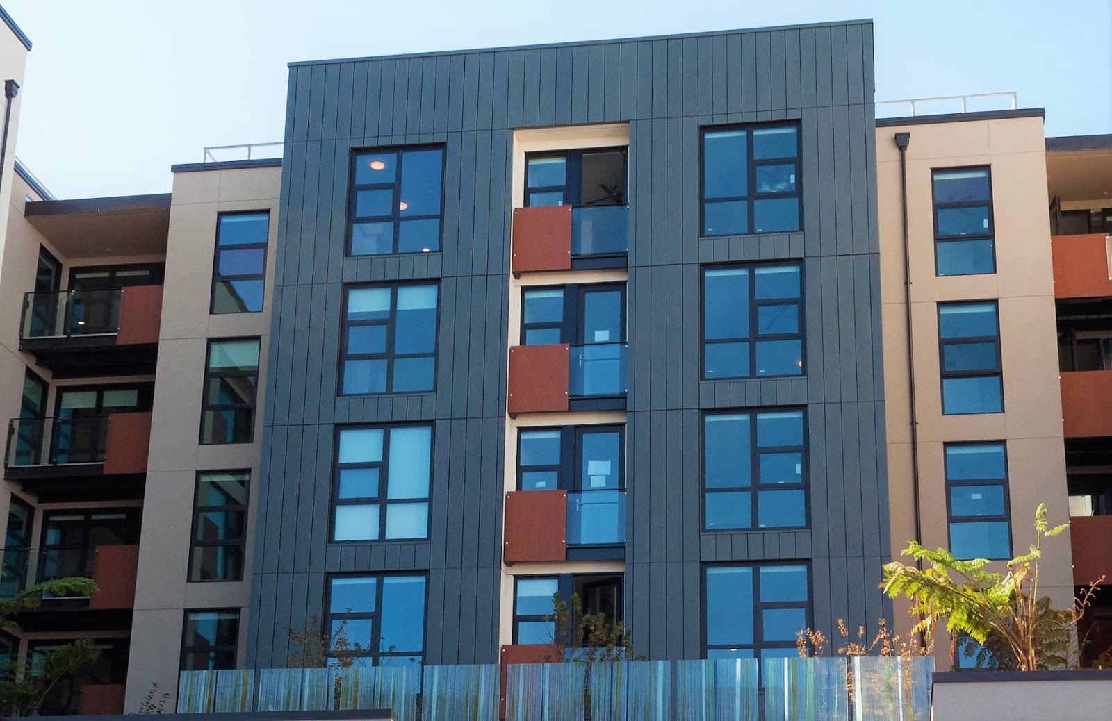 Folded Zinc Panels in One Henry Adams, A Multi-Family Residence in ...