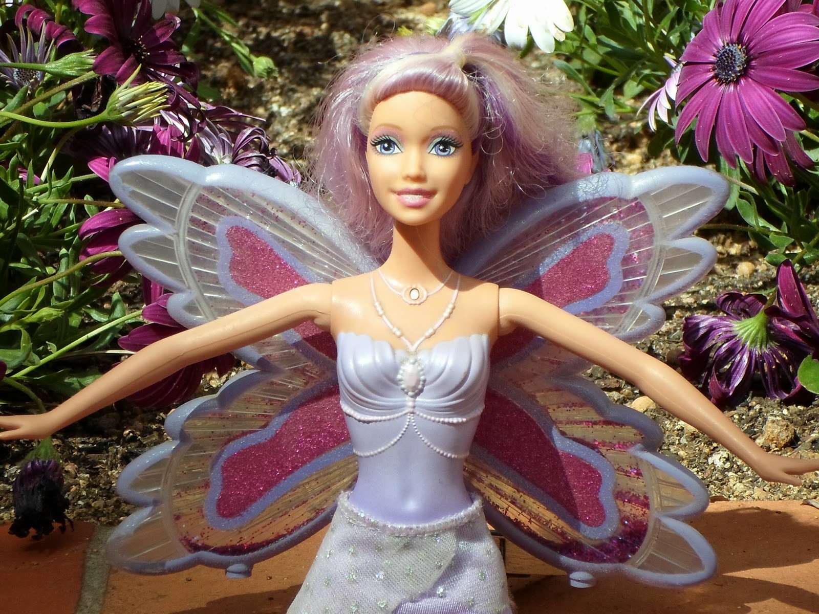 El rincón de mis muñecas: Barbie Glitter Swirl Fairy morada de la ...