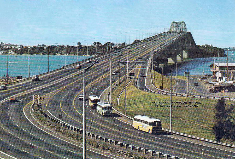 transpress nz: buses drive off the Auckland Harbour Bridge, late 1960s