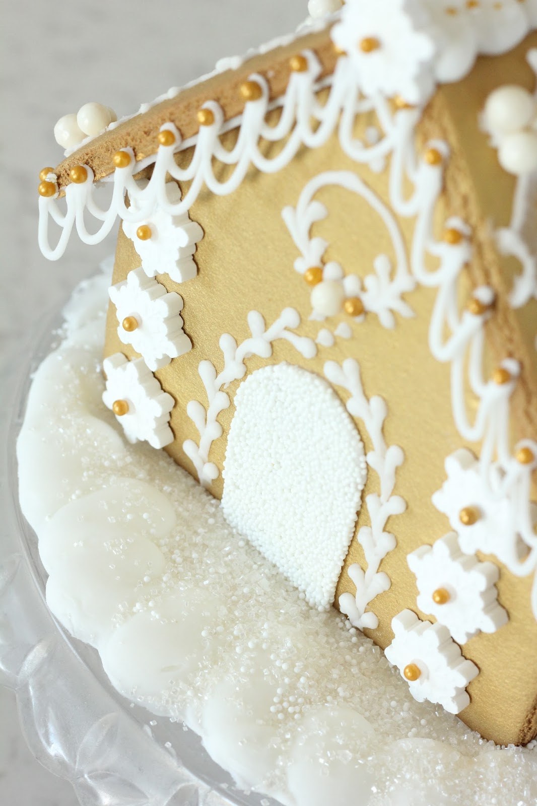 White and Gold Gingerbread House