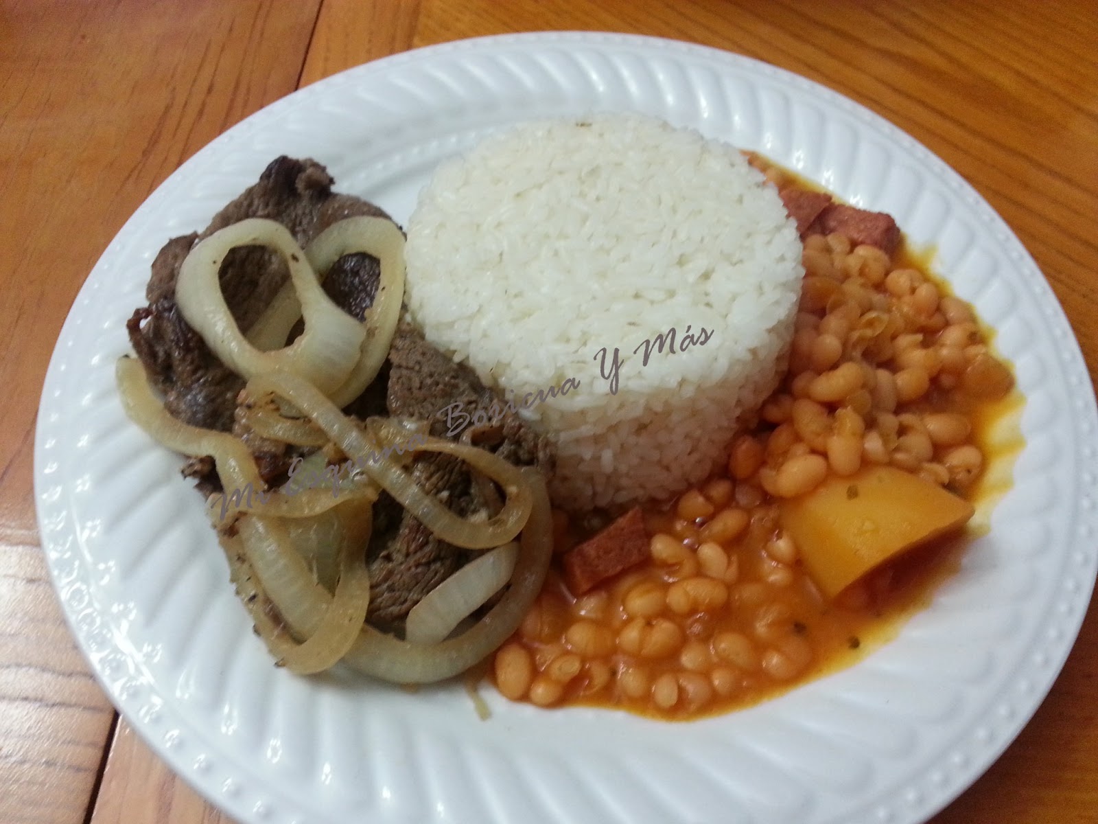 Bistec Encebollado Con Arroz