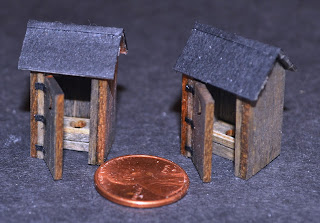 Nirvana Valley Model Railroad: Logging camp cabins, outhouses, and a boat