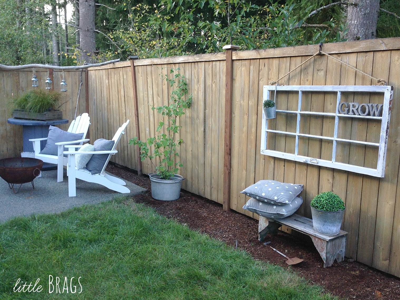 Little Brags: Hanging An Old Window From The Fence