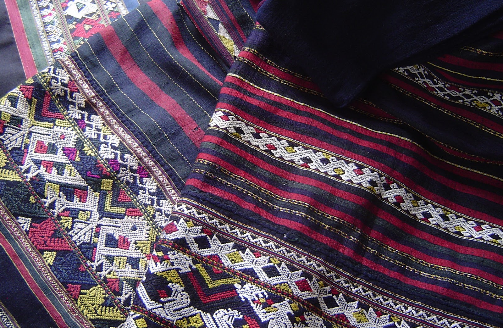 Lao Textiles: Lao women wearing Sinh