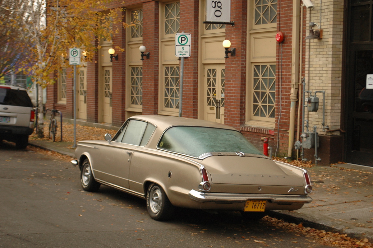 OLD PARKED CARS.: 1964 Plymouth Valiant Barracuda.
