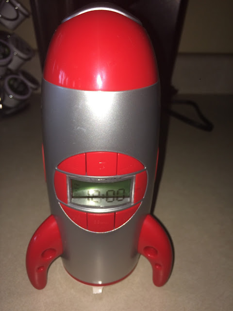 Fly to the moon on the Big Red Rooster Rocket Ship Projection Alarm ...