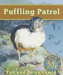 Momo celebrating time to read: Puffling Patrol by Ted and Betsy Lewin