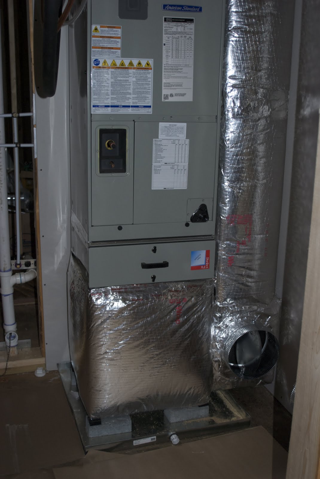 Passive Solar Residence: Rough-ins, exterior paint, and finish grading