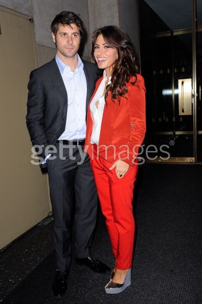 Ladies in Satin Blouses: Sarah Shahi - white satin blouse under red ...