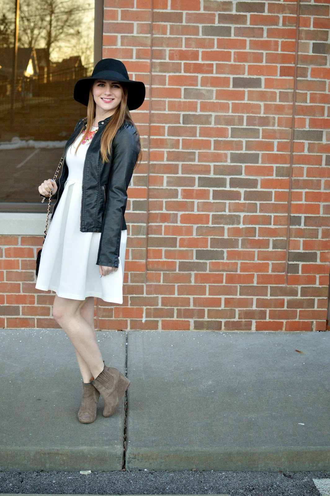 Styling The Perfect Blend: White Dress And Leather Jacket Ensemble