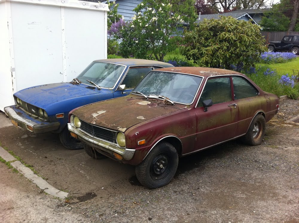 OLD PARKED CARS.: Mossy Mazda #2: Badgeless 1971 Mazda R100 Coupe.