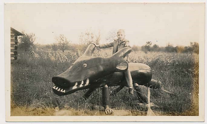 Anonymous Works: Boy Riding a Folk Art Sculpture of a Dog