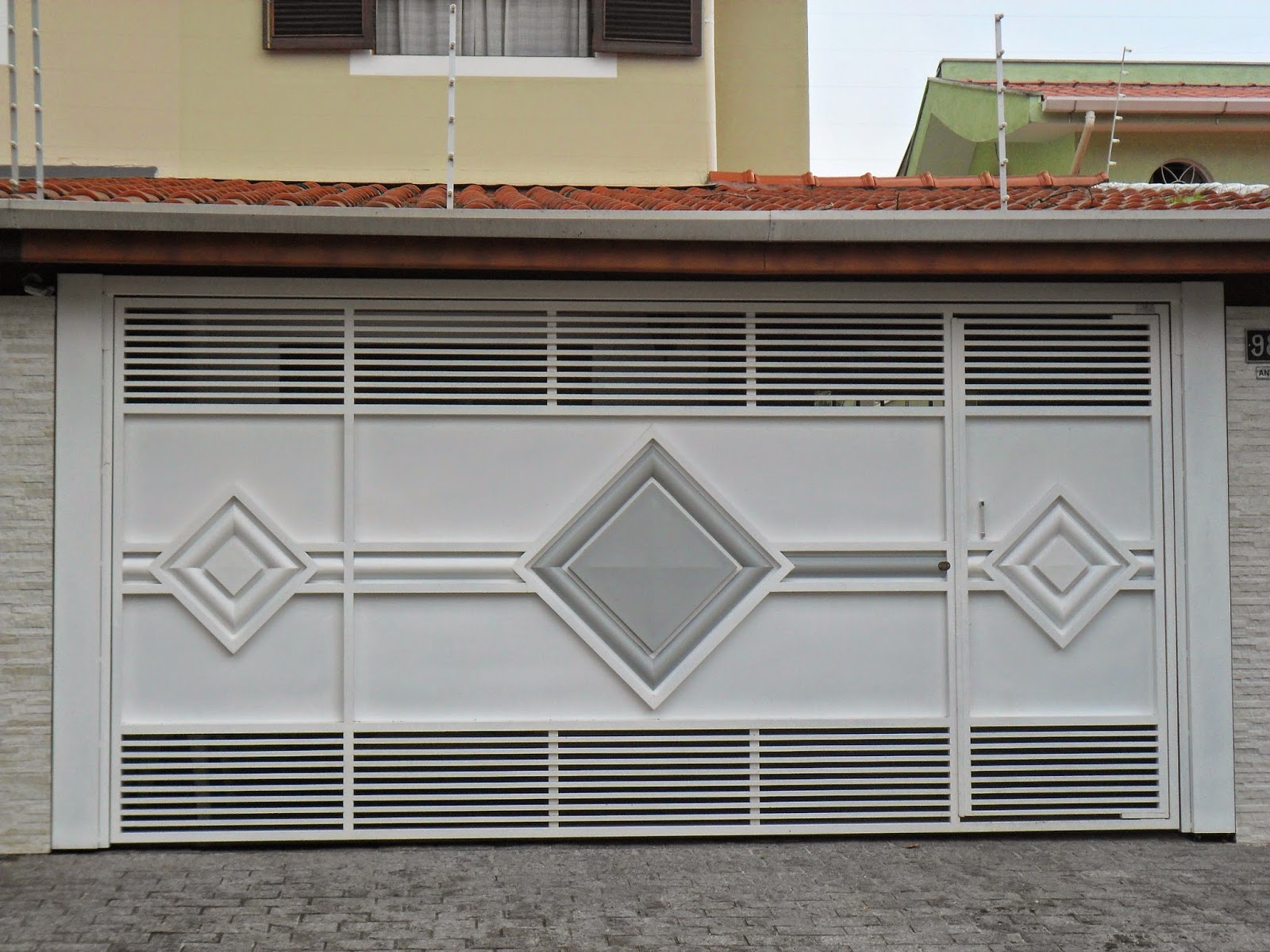 New Port Portões Automáticos: Portões basculantes