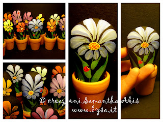 Bomboniere matrimonio: margherite colorate dipinte su sasso , in ...