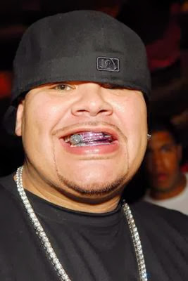 25 Photos Of Rappers Wearing Grillz ~ Its All About Hip Hop Music & Culture