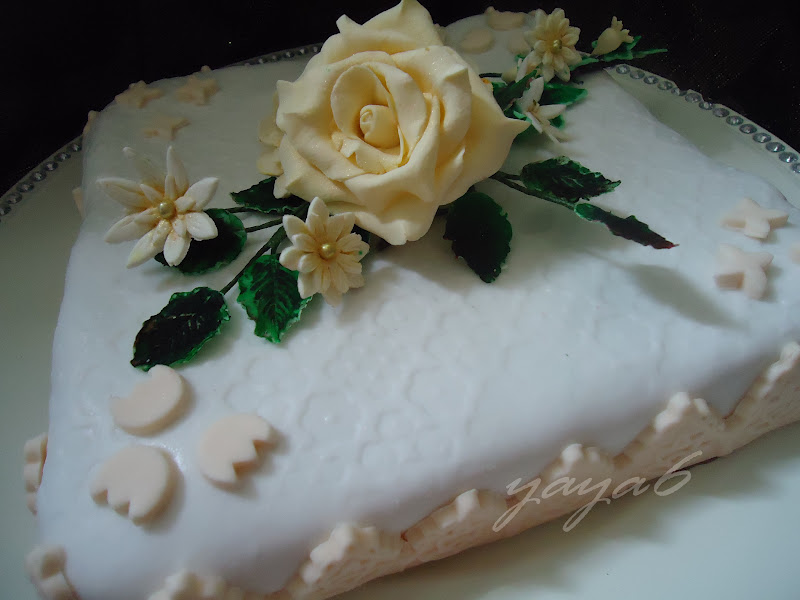 Tort cu crema de unt ,cacao si esenta de rom