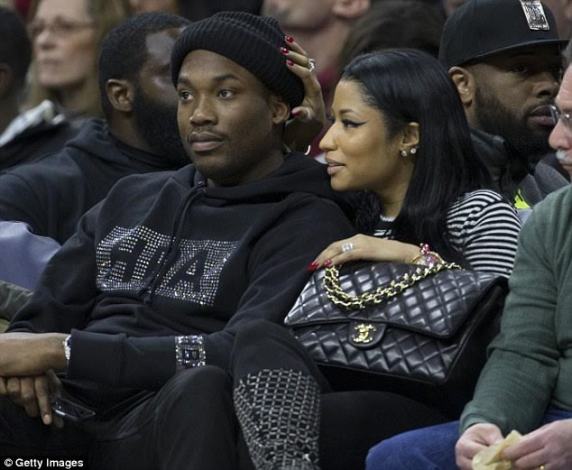 Nicki Minaj finds time for make-up touch up while at basketball game