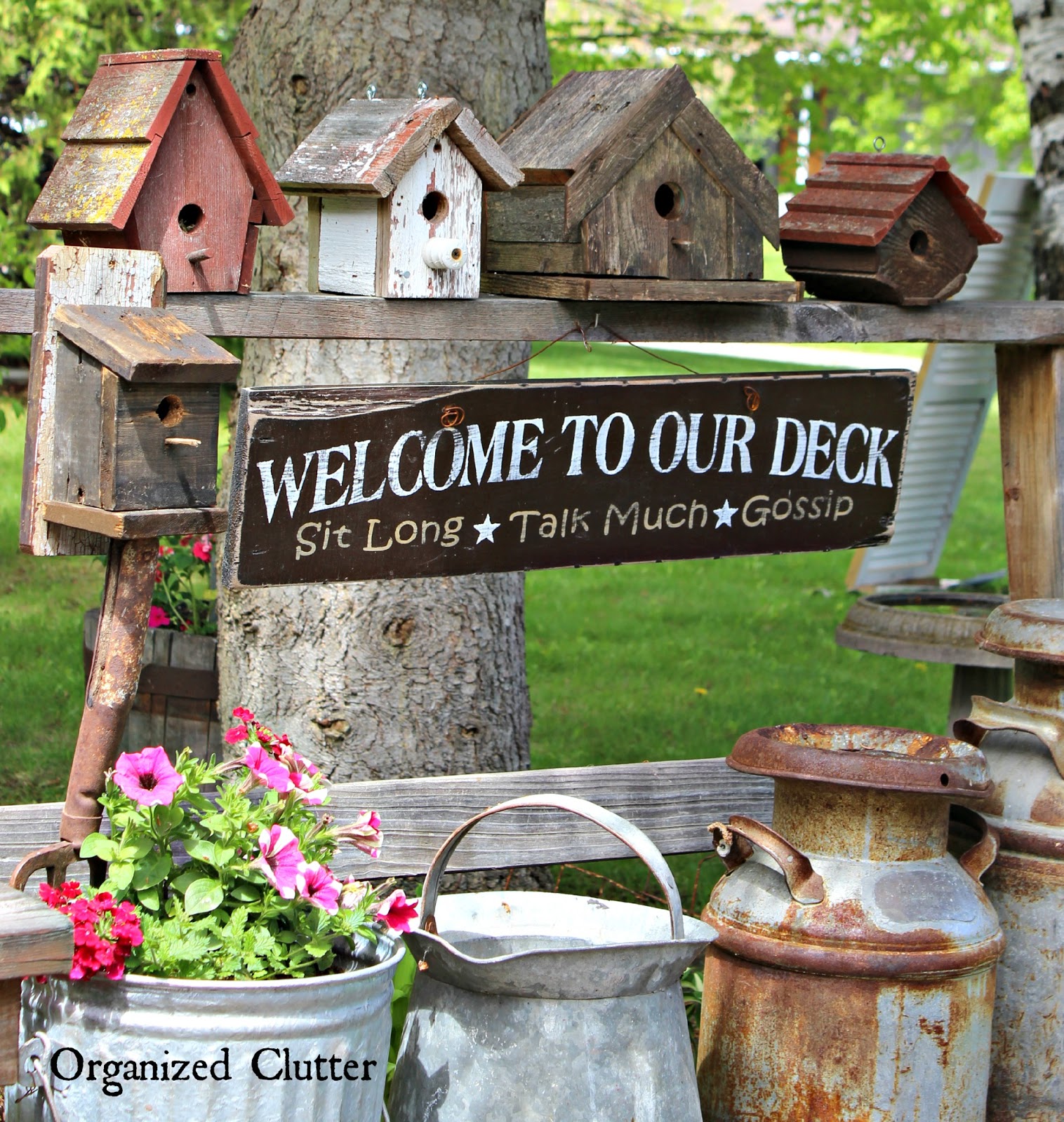 Decorating the Deck with Rustic Birdhouses - Organized Clutter