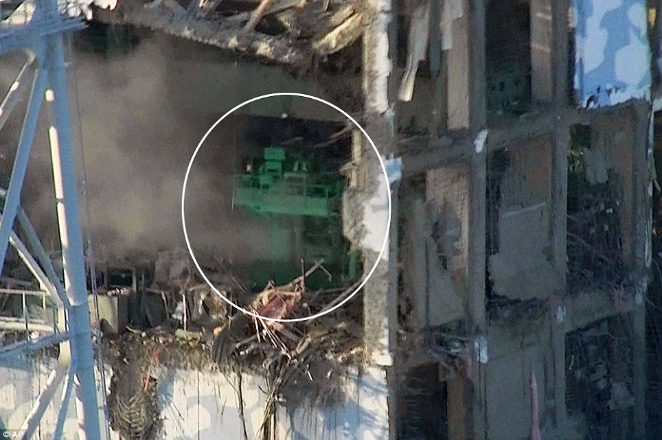 Exposed: Nuclear fuel rods inside wrecked reactor as experts predict ...