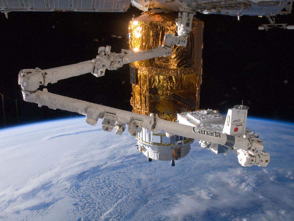 Suburban spaceman: NASA ISS Image: Canadarm2 and HTV-3, currently docked