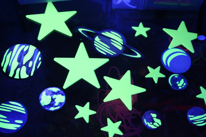 Learning At Play: Black Light Solar System
