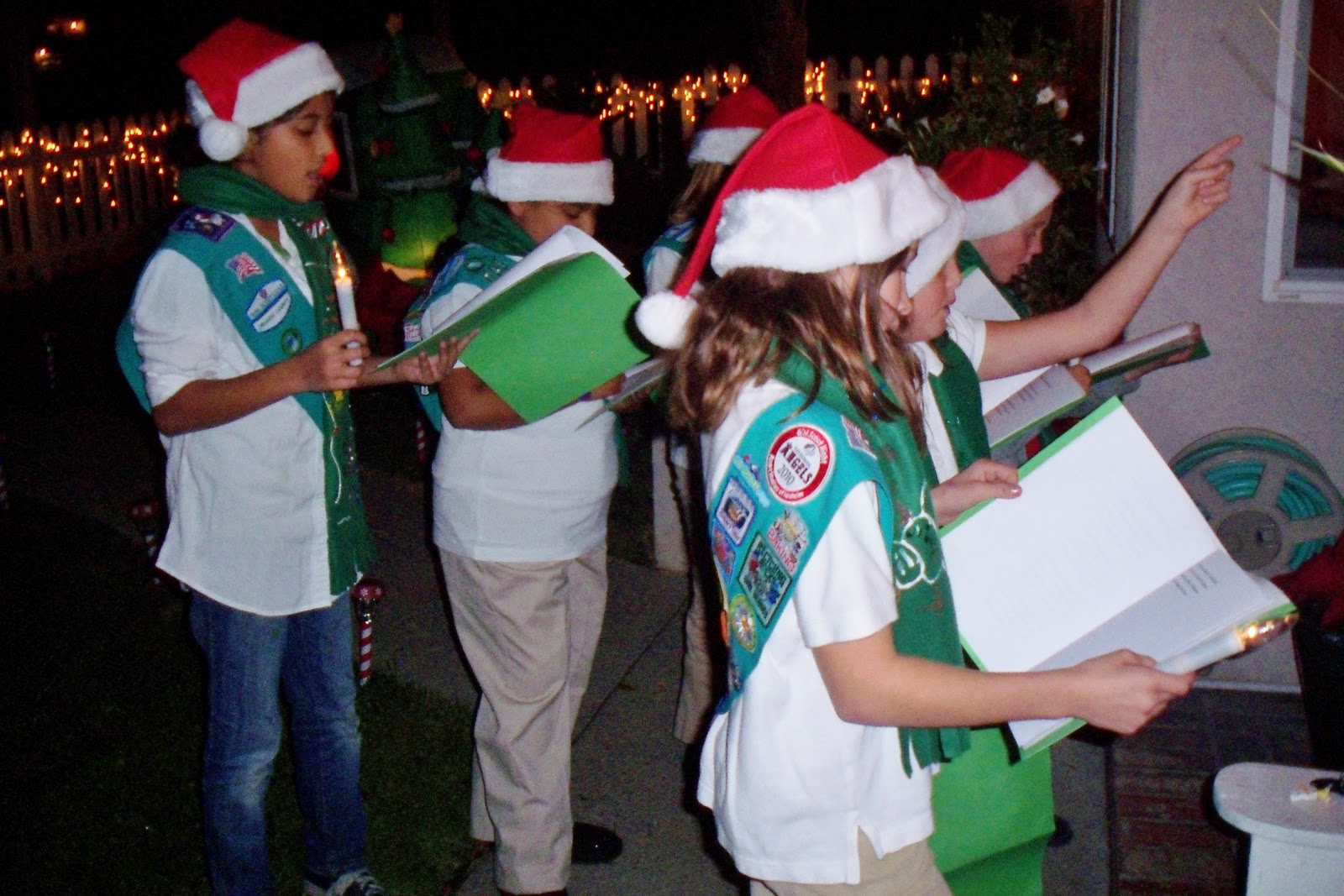 HUNTINGTON BEACH GIRL SCOUT TROOP 746: CHRISTMAS CAROLING 2011