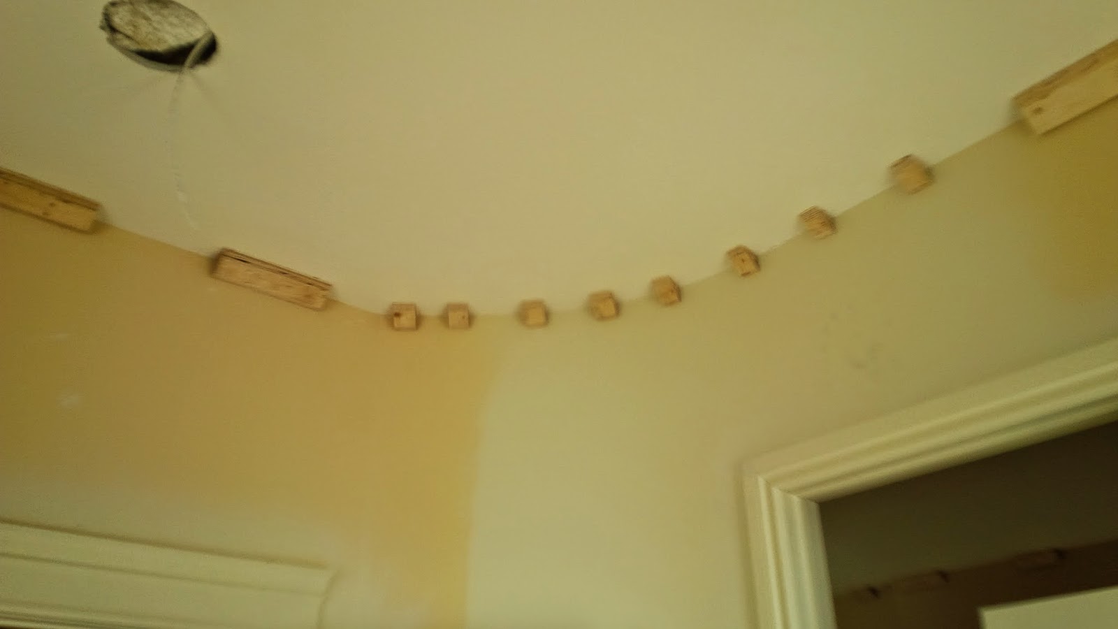 Exclusive Spaces Installing Curved Crown Molding