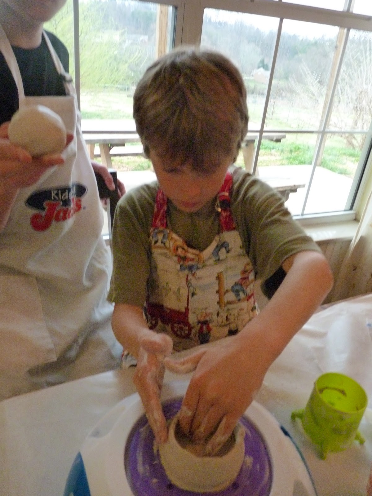 At the Butterfly Ball: Throwing Clay