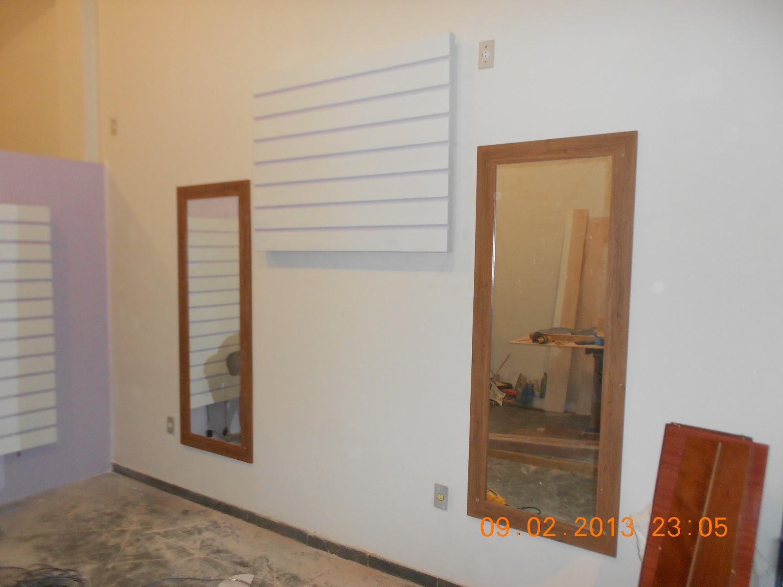 Amil International Moveis: Instalacão dos paineis e espelhos do salão Vicion